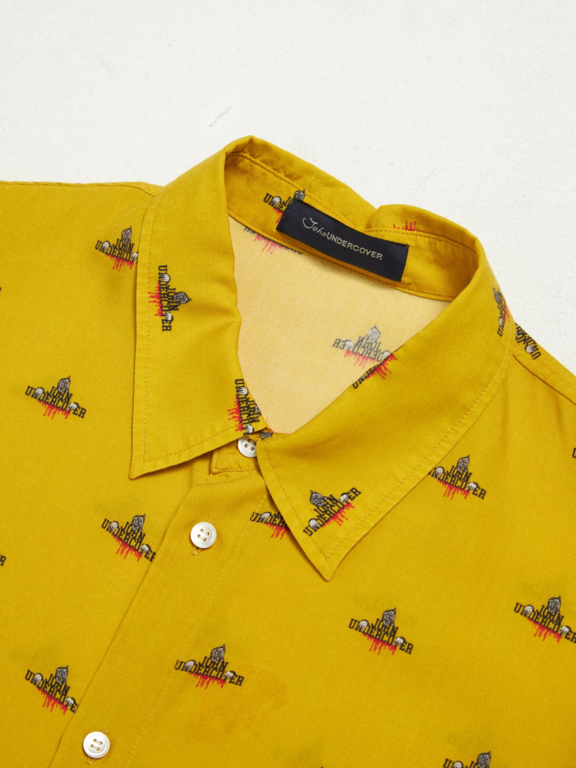 Undercover John Yellow All Over Logo Printed Tencel Shortsleeved Shirt